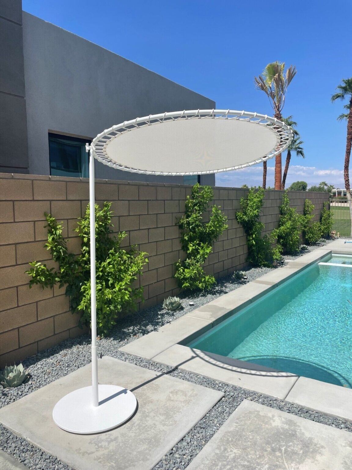 17 stylish patio umbrellas that will transform your backyard